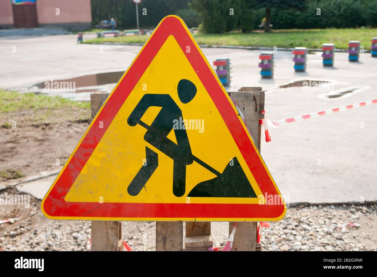 Yellow safety sign warns about roadworks. Under Construction sign Stock ...