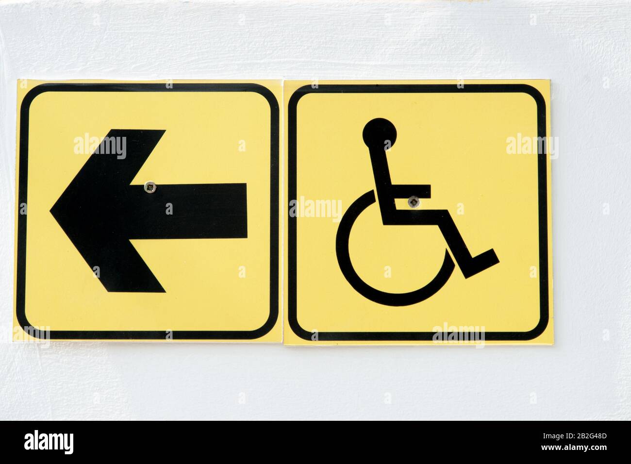 The disabled street on left sign Stock Photo - Alamy