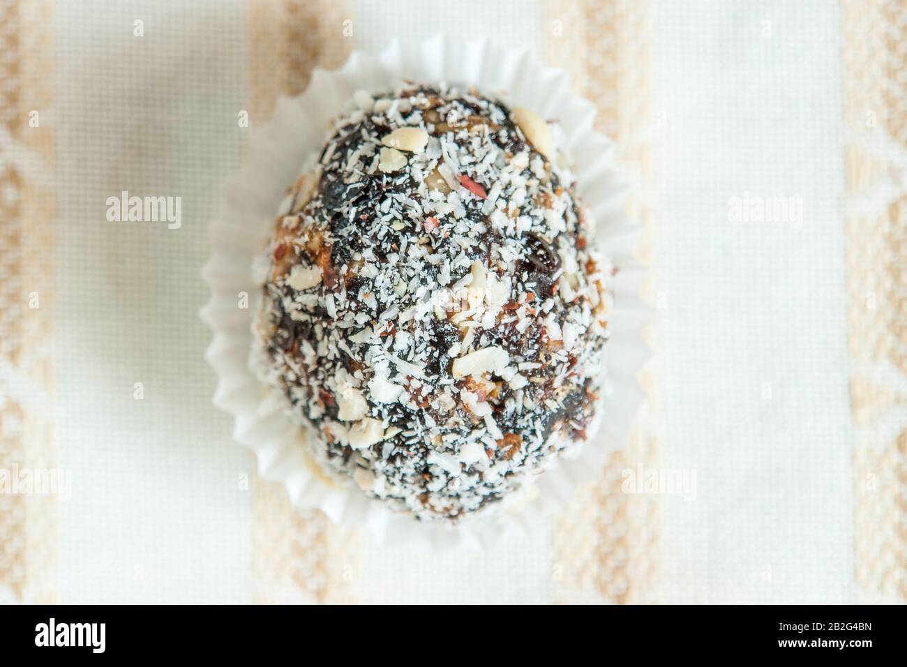 Homemade candy with prune, peanut and coconut flakes Stock Photo - Alamy