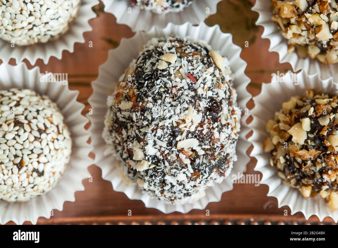Homemade candy with prune, peanut and coconut flakes Stock Photo - Alamy