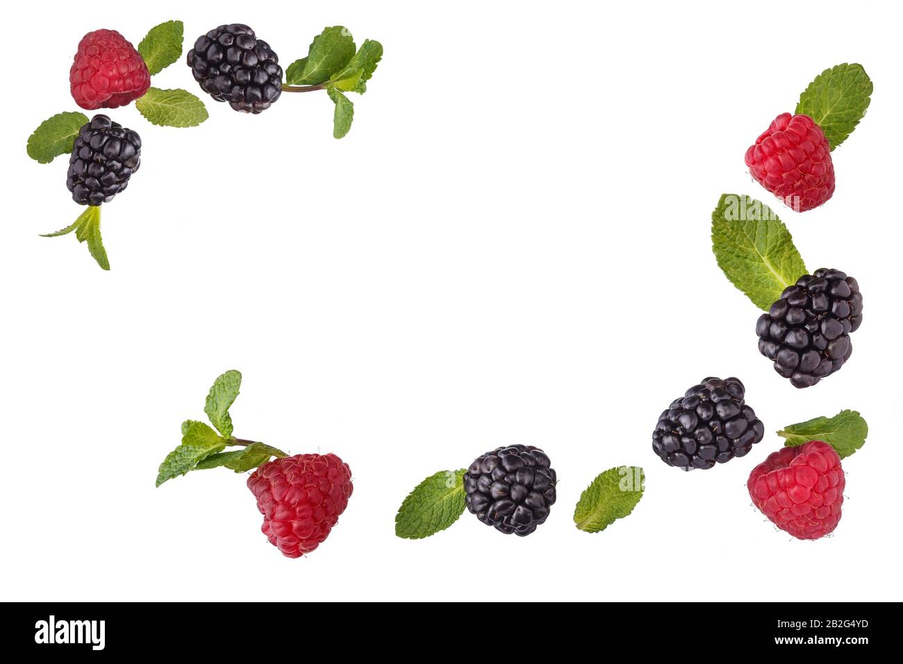 Frame of fresh berries and mint leaves isolated on white background ...