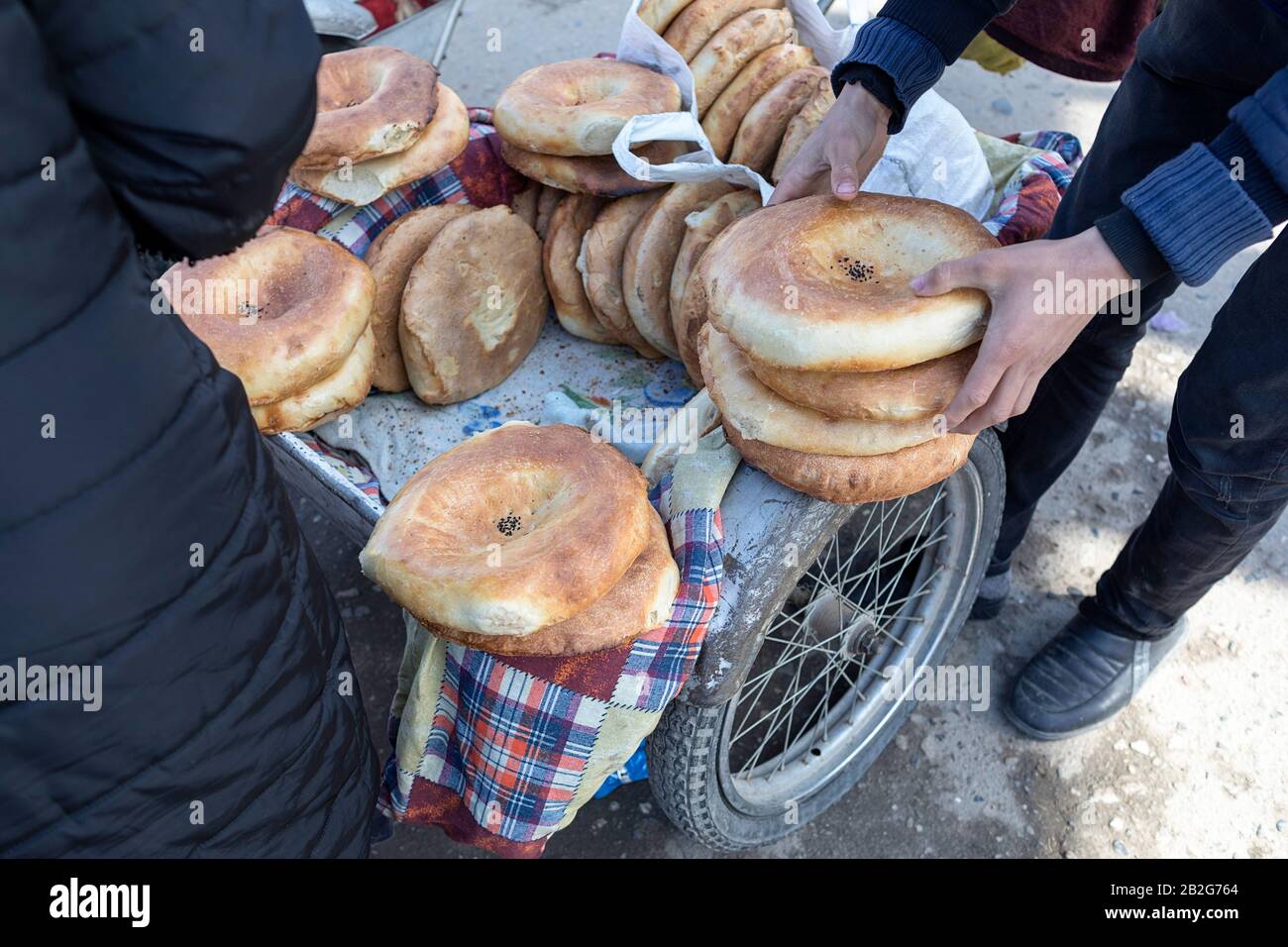 National uzbek bread sold in the market in bazaar, Uzbekistan, Central ...