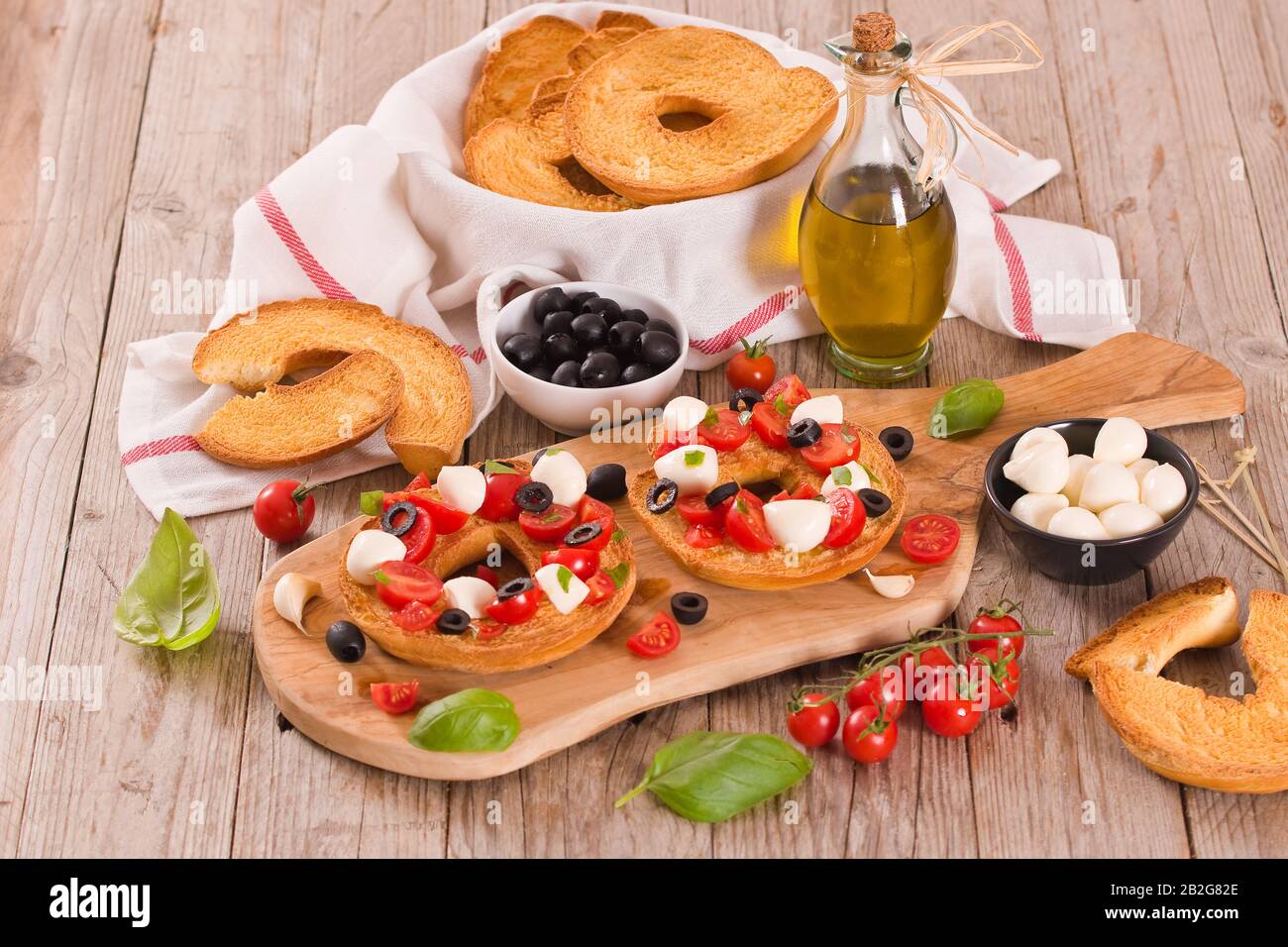 Friselle with tomatoes and mozzarella cheese Stock Photo - Alamy