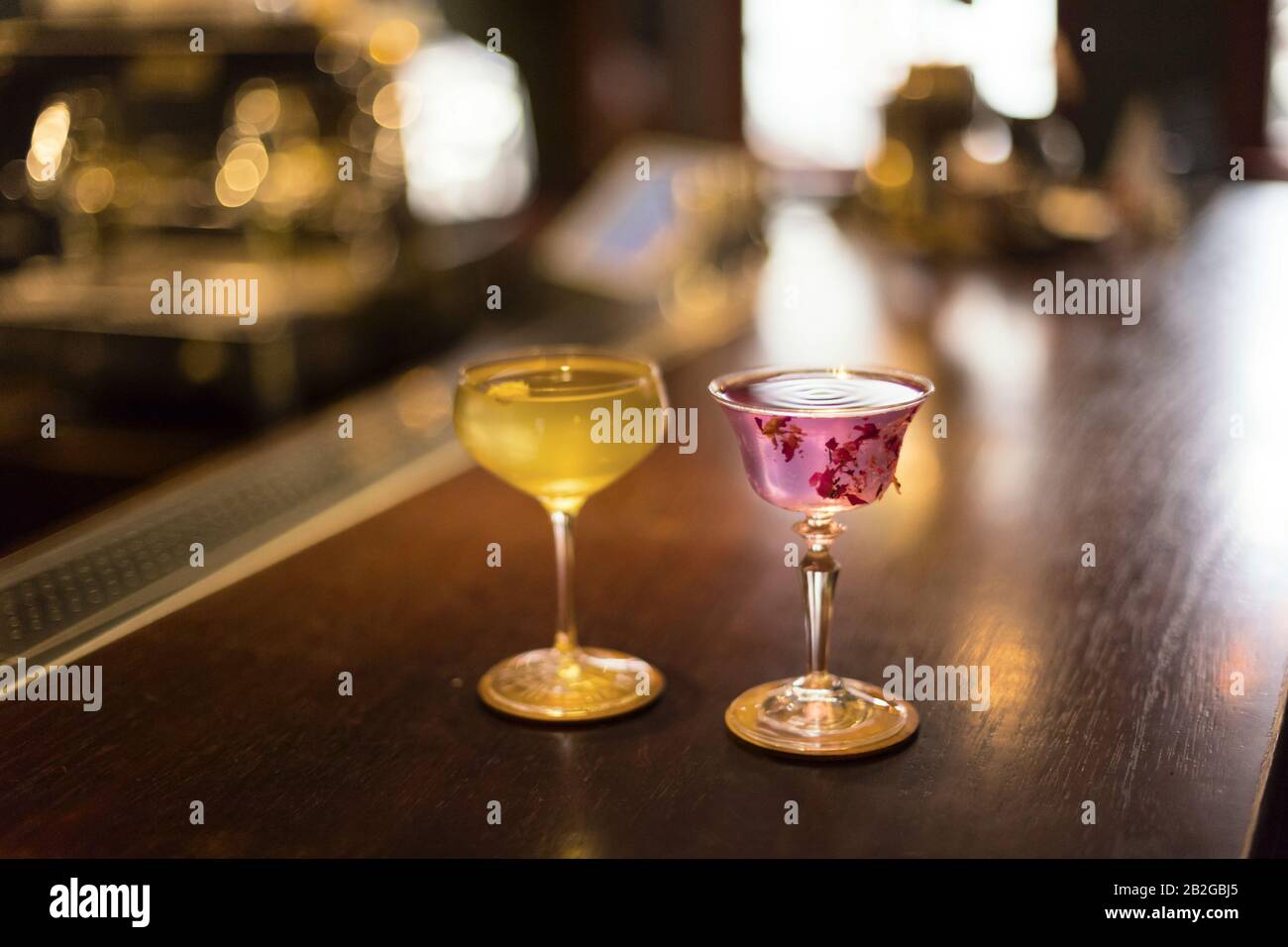 Two cocktails on bar counter Stock Photo - Alamy
