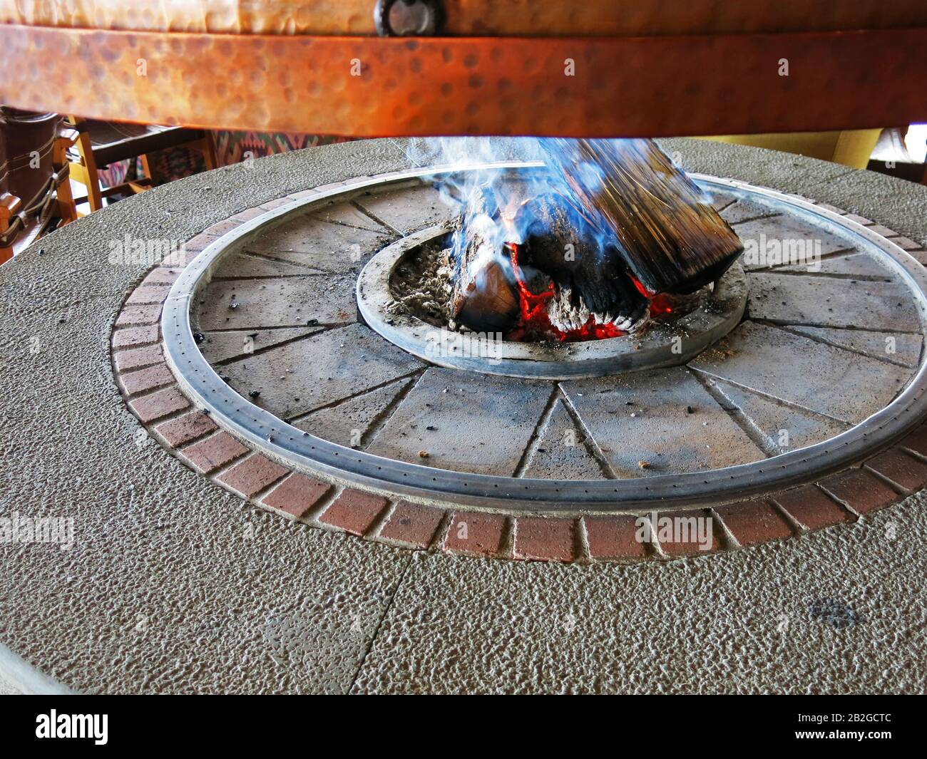 Smoldering log in fireplace close hi-res stock photography and images ...