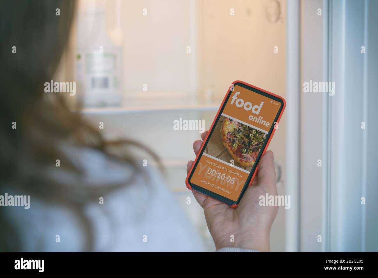 Ordering food online with smart phone at home Stock Photo - Alamy