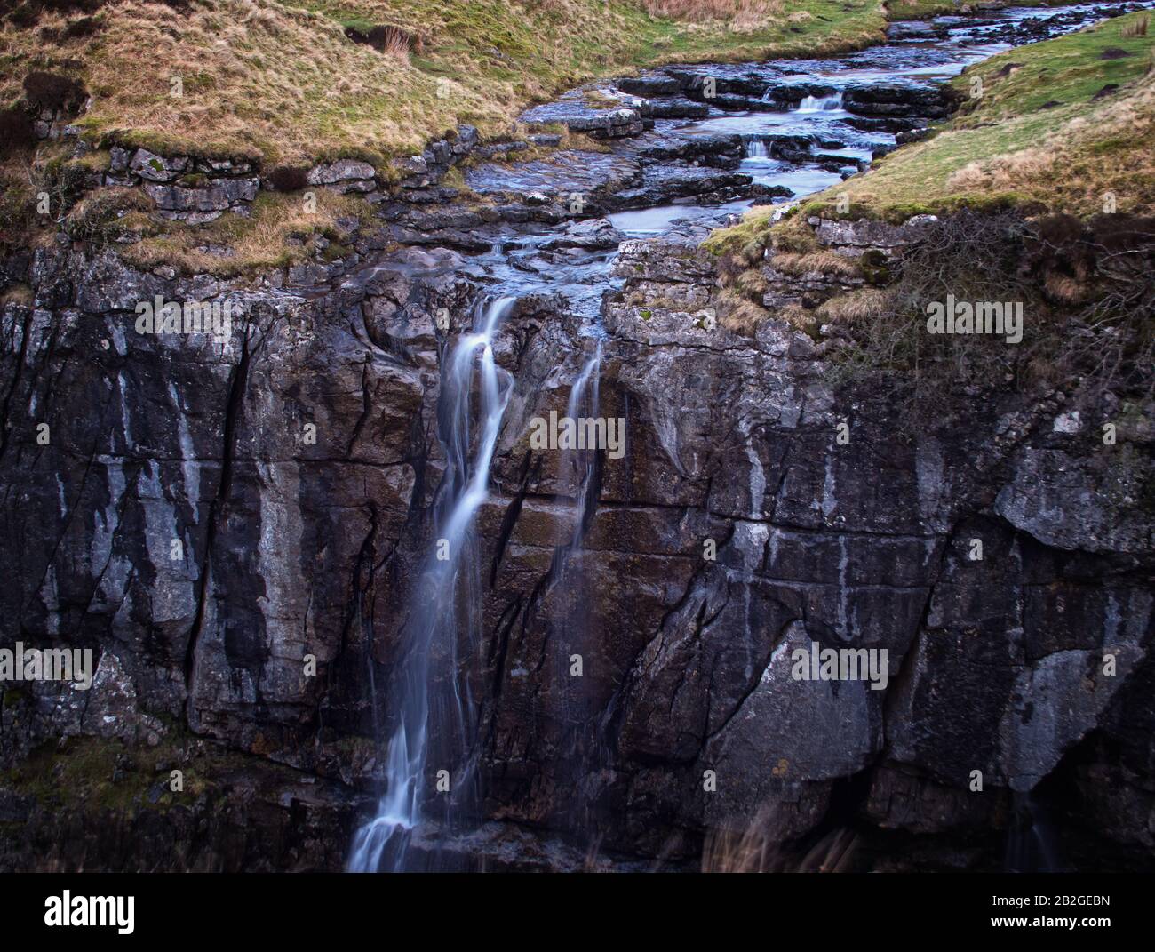 Water flowing over the edge of Hull Pot, Pen-y-Ghent, Yorkshire Dales ...