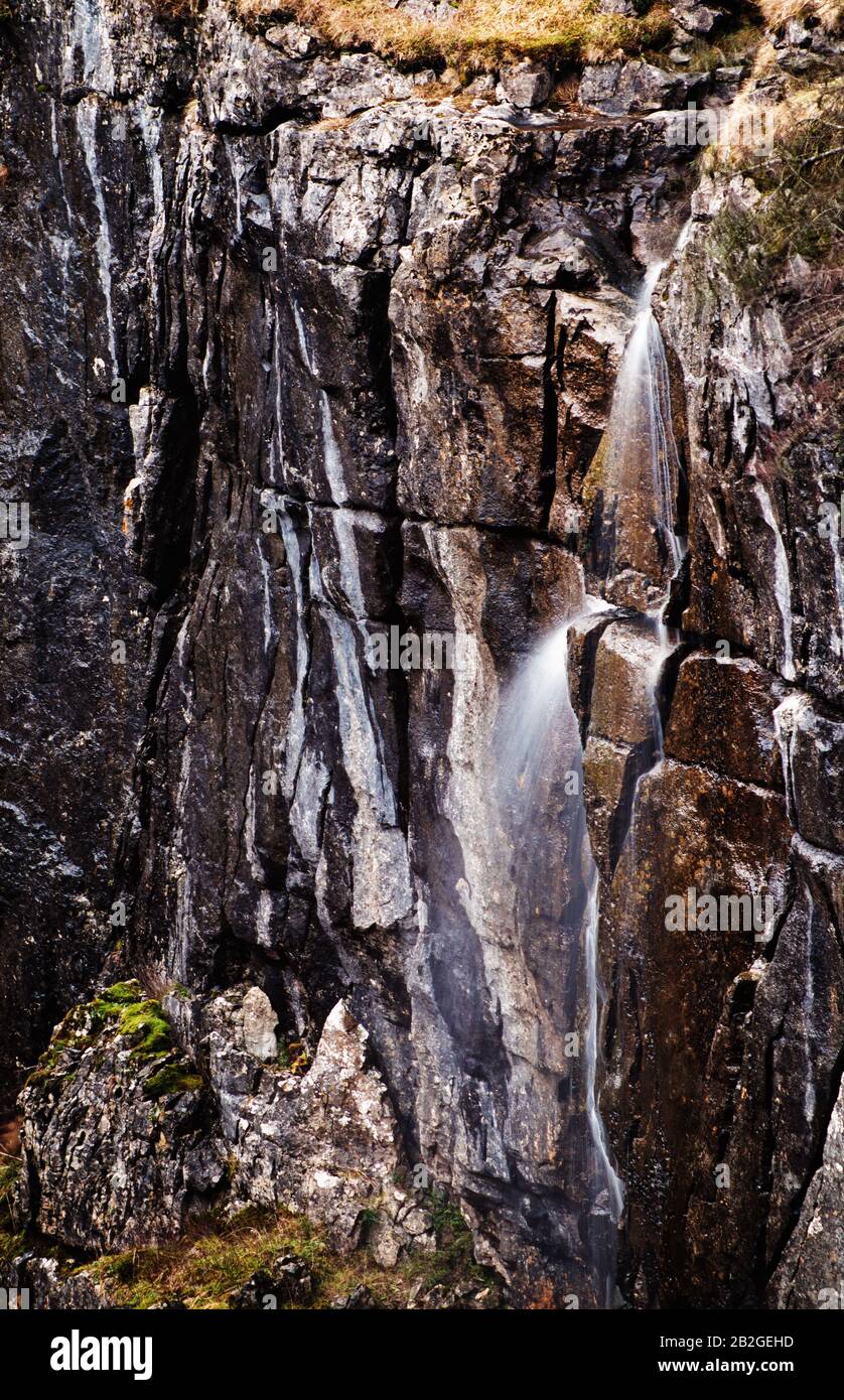 Water flowing through the striations of Hull Pot. Pen-y-Ghent ...