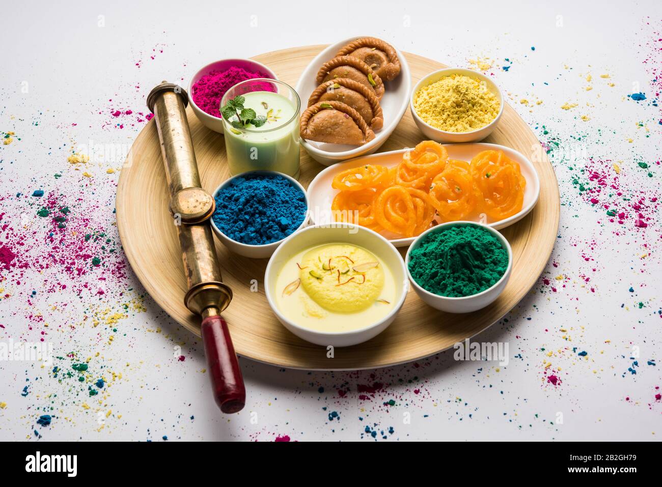 Happy Holy concept showing Indian assorted sweets like jalebi, gujiya ...