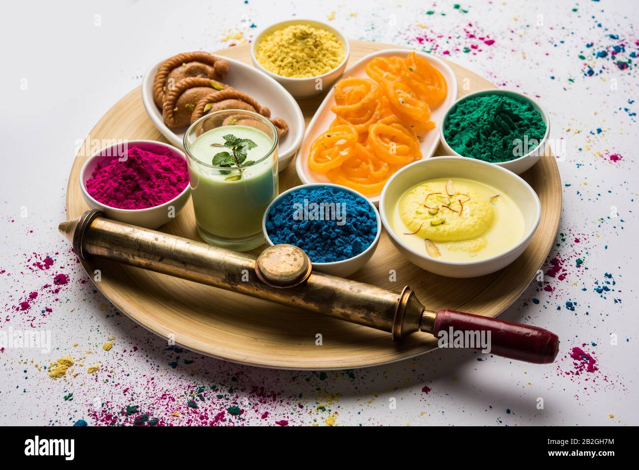 Happy Holy concept showing Indian assorted sweets like jalebi, gujiya ...