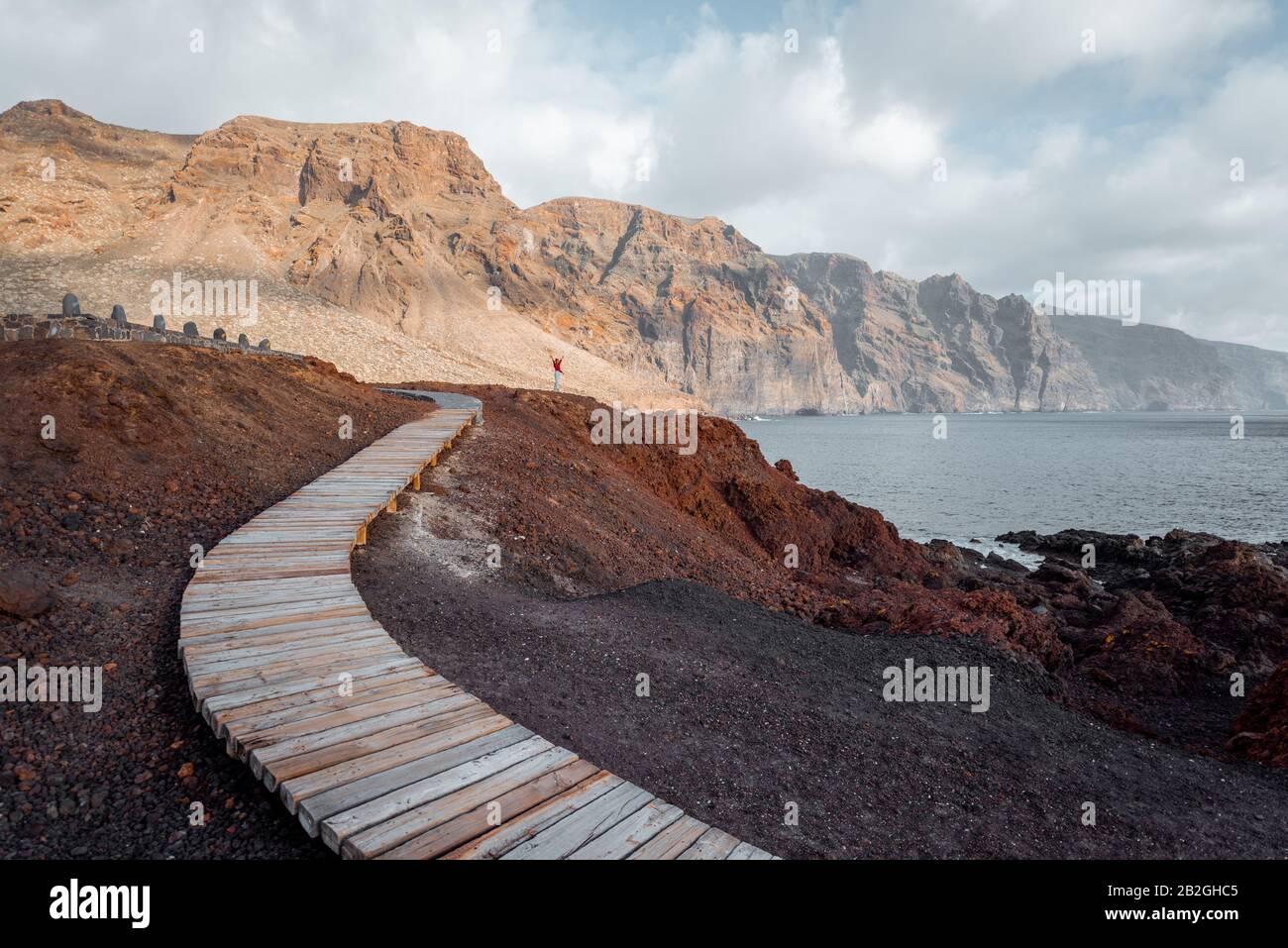 Landscape with picturesque wooden pathway through the rocky land and ...