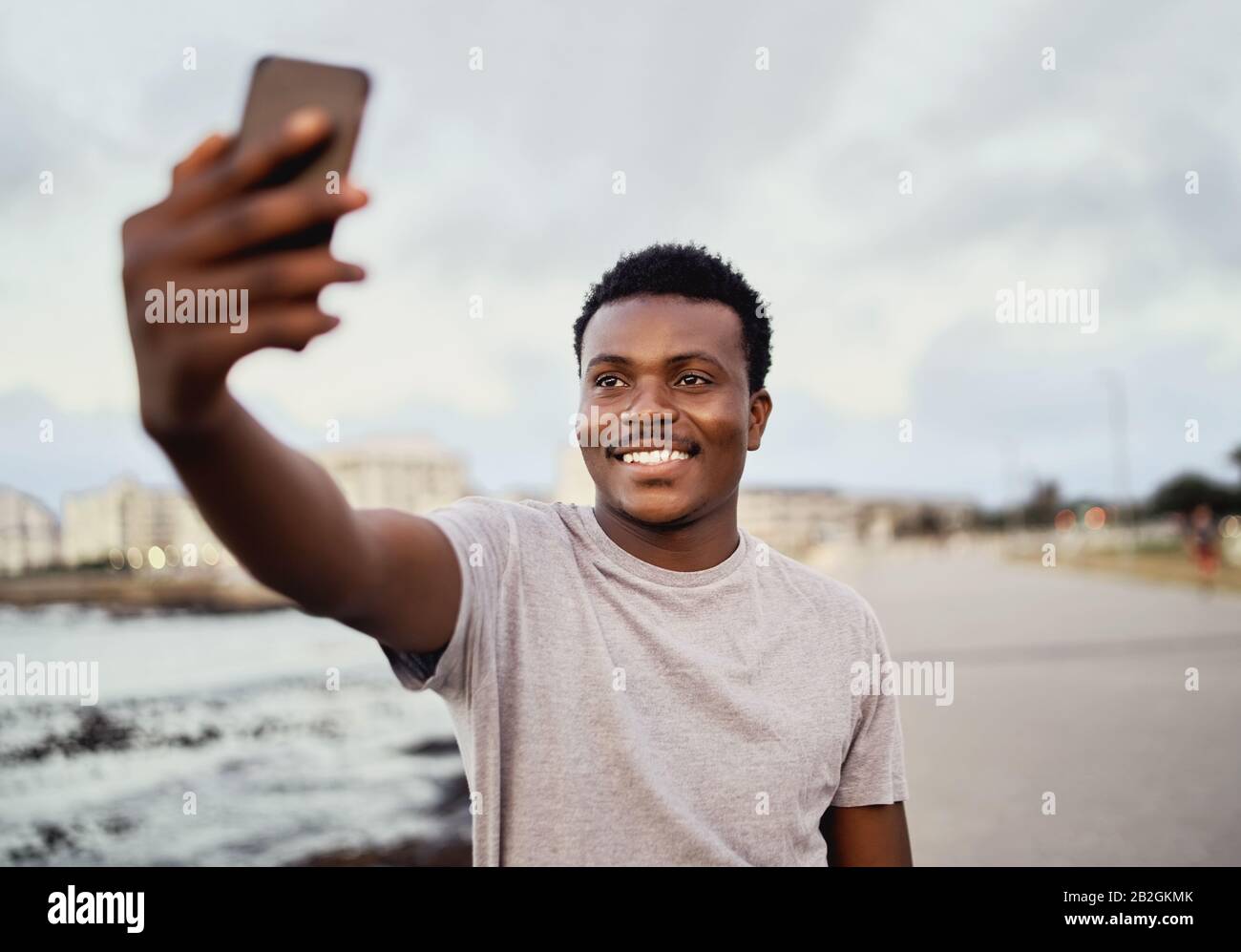 Black portrait smiling athlete man hi-res stock photography and images ...