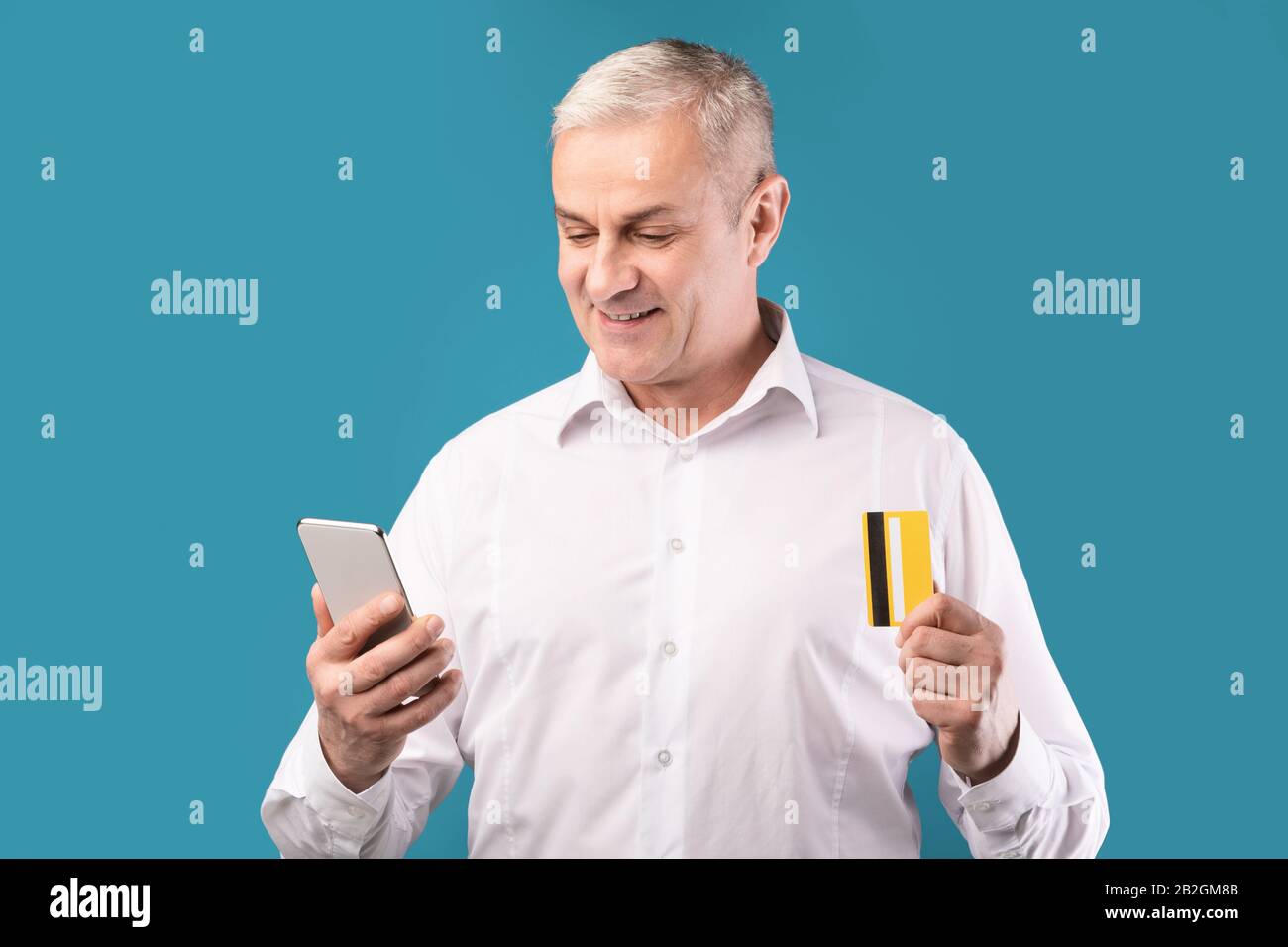Holding debit card hi-res stock photography and images - Alamy