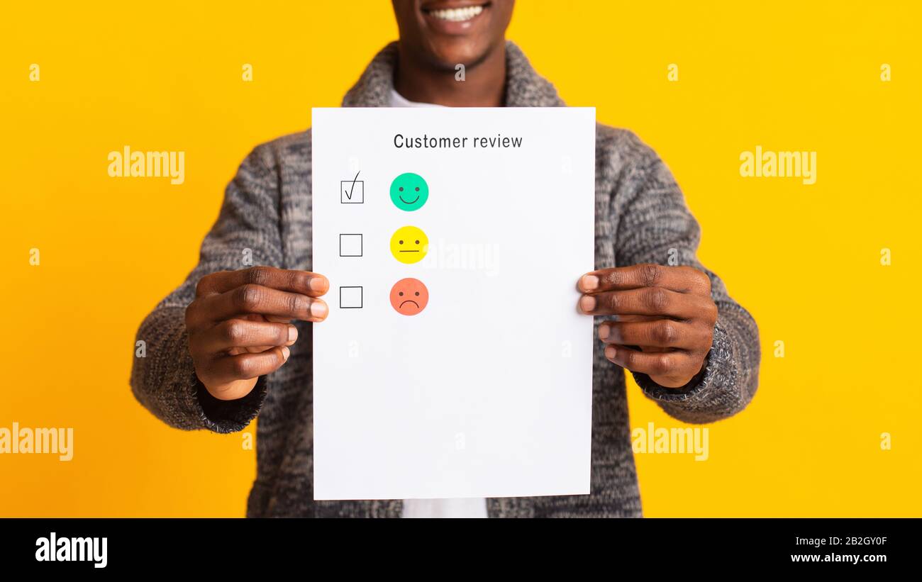 Smiling face review hi-res stock photography and images - Alamy