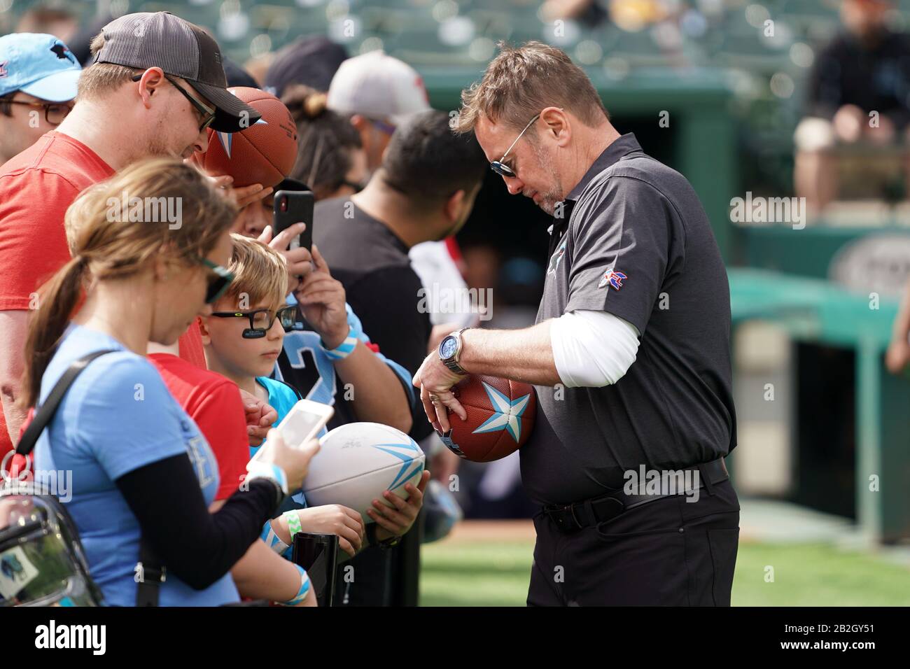 Dallas Renegades Head Coach Bob Stoops greets fans and signs autographs ...
