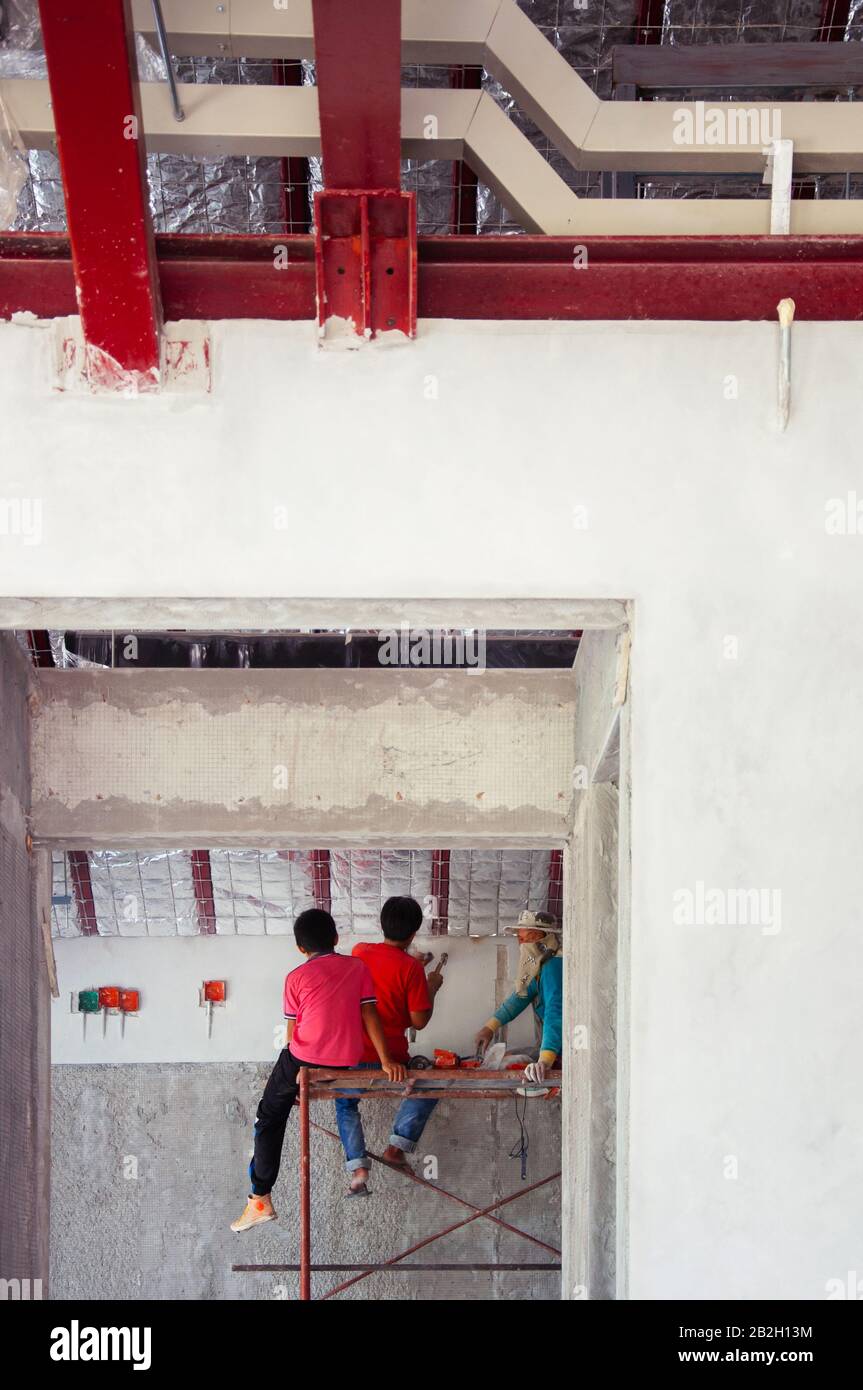 MAY 8, 2010 Bangkok, Thailand - Local poor young Asian building ...