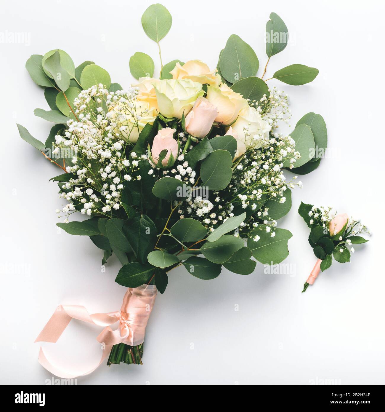 Bridal bouquet of cream roses on white background Stock Photo - Alamy