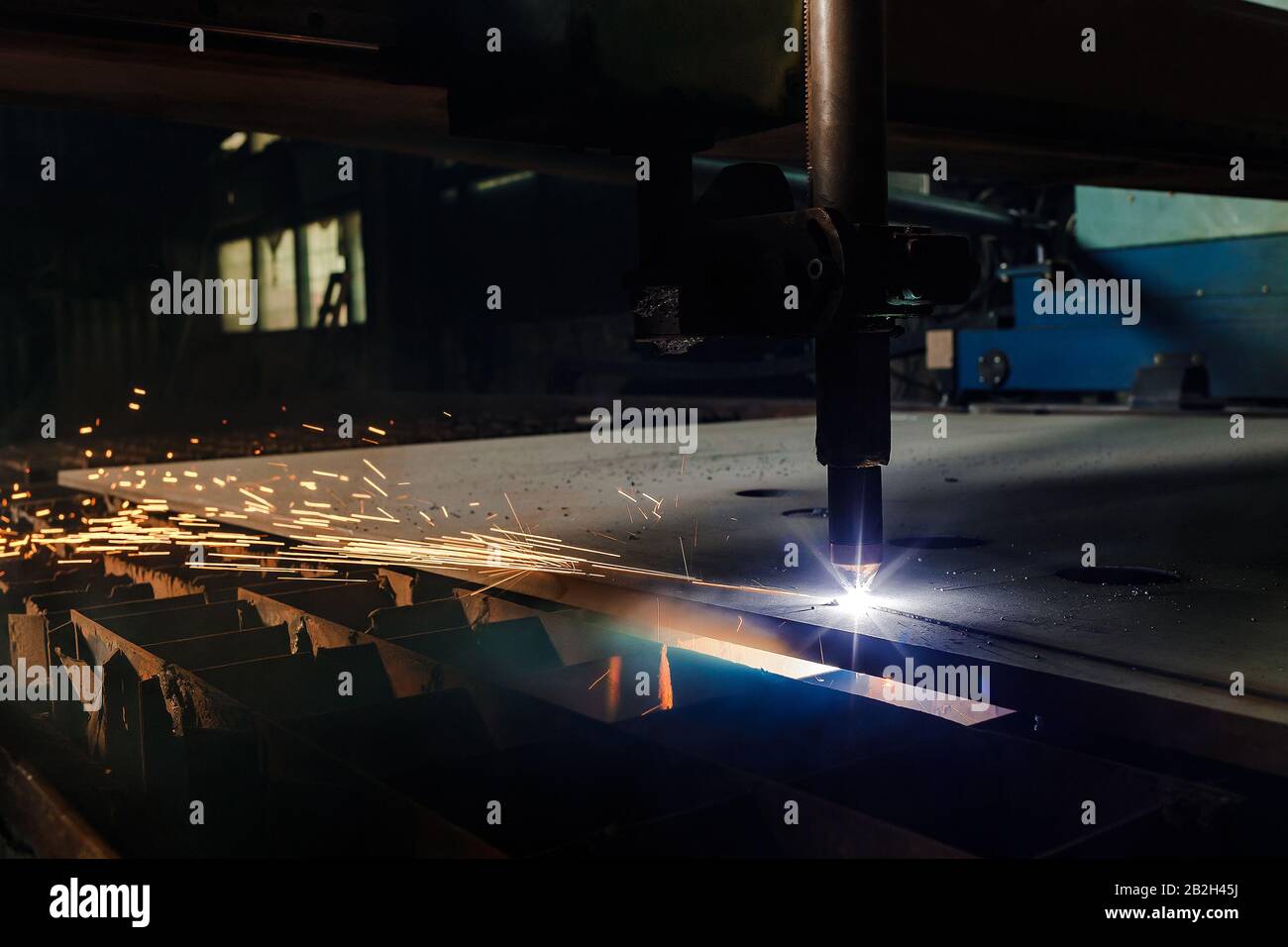 Plasma cutting of metal with a cnc. Plasma cutting machine cutting ...