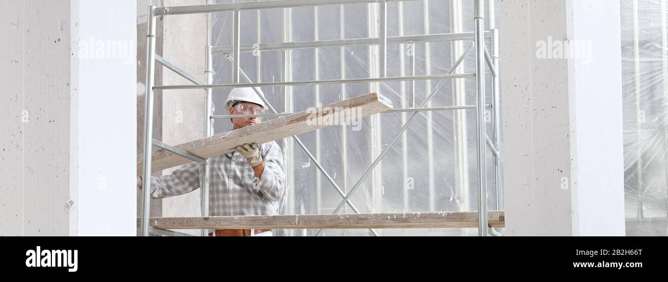 man work, professional construction worker on scaffolding safety hard ...
