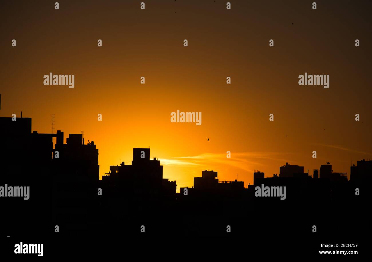 Romantic Sunset with strong orange color Stock Photo - Alamy