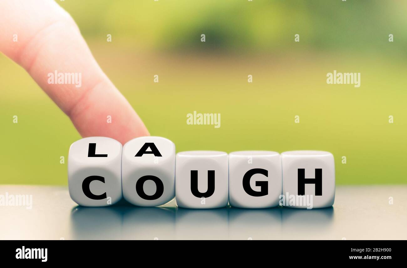 Laughter is the best medicine. Hand turns dice and changes the word ...