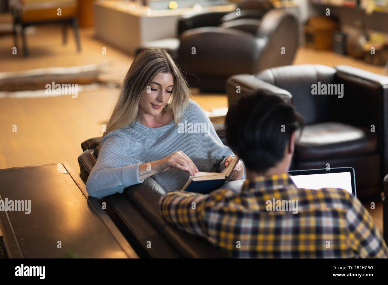 Interracial couple reading book hi-res stock photography and images - Alamy