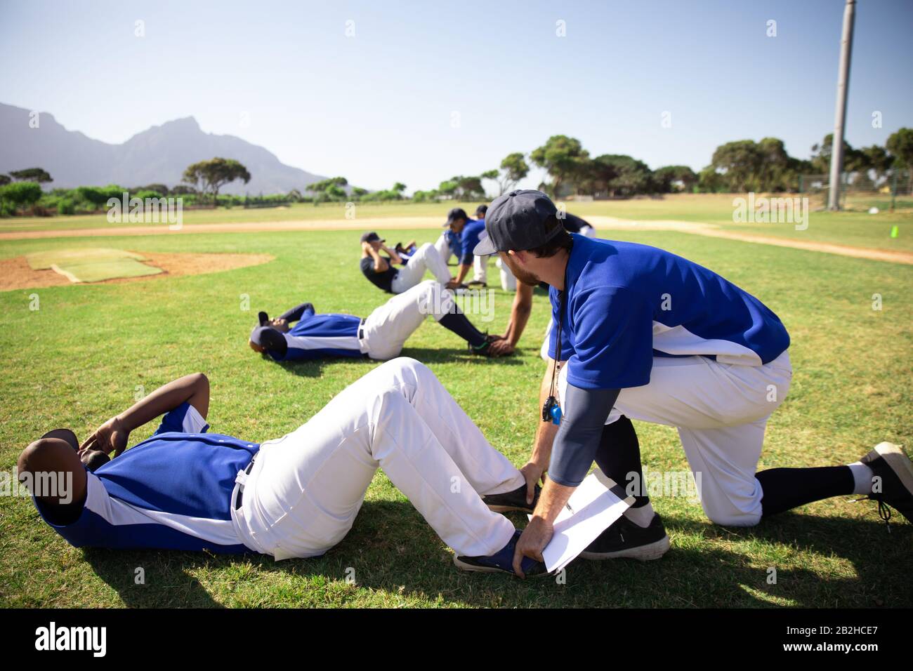 Baseball players training Stock Photo - Alamy