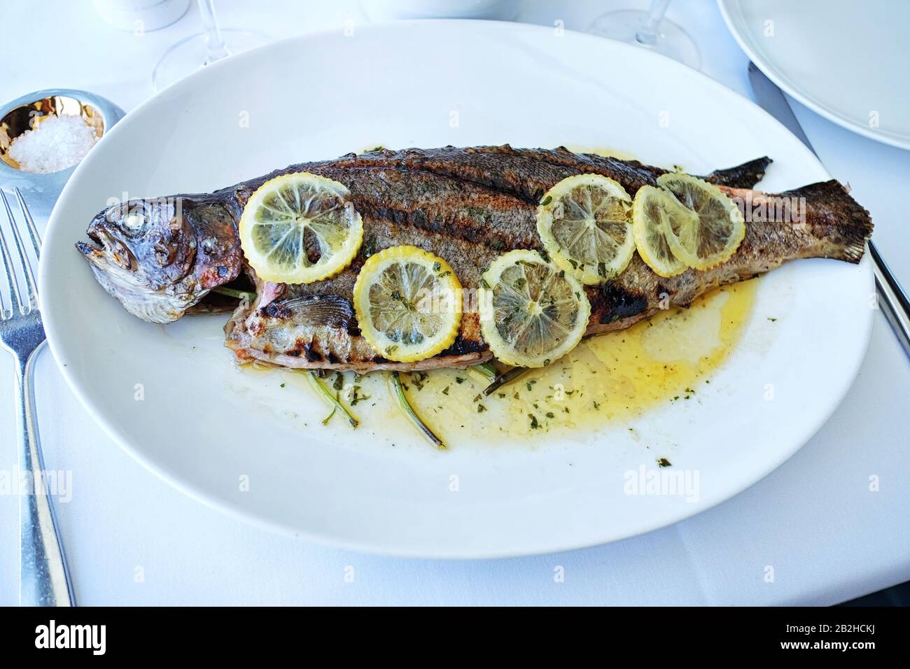 Whole Rainbow Trout, served with sliced lemon, Lunch At Icebergs Dining ...