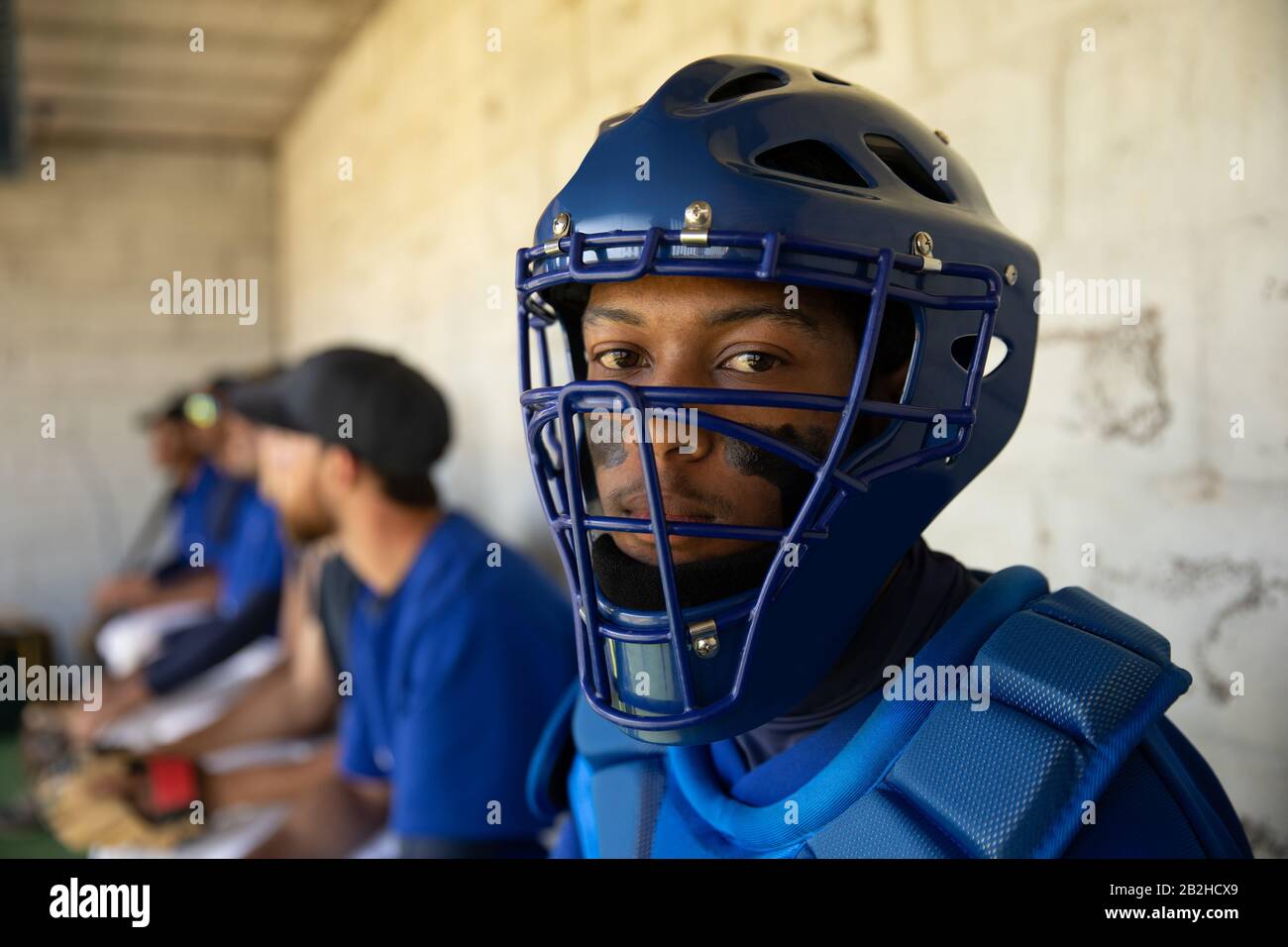 Baseball player looking at camera Stock Photo - Alamy
