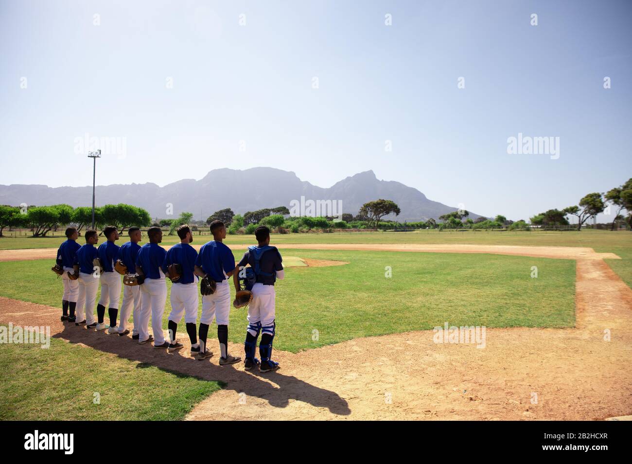Standing communication looking away uniform hi-res stock photography ...