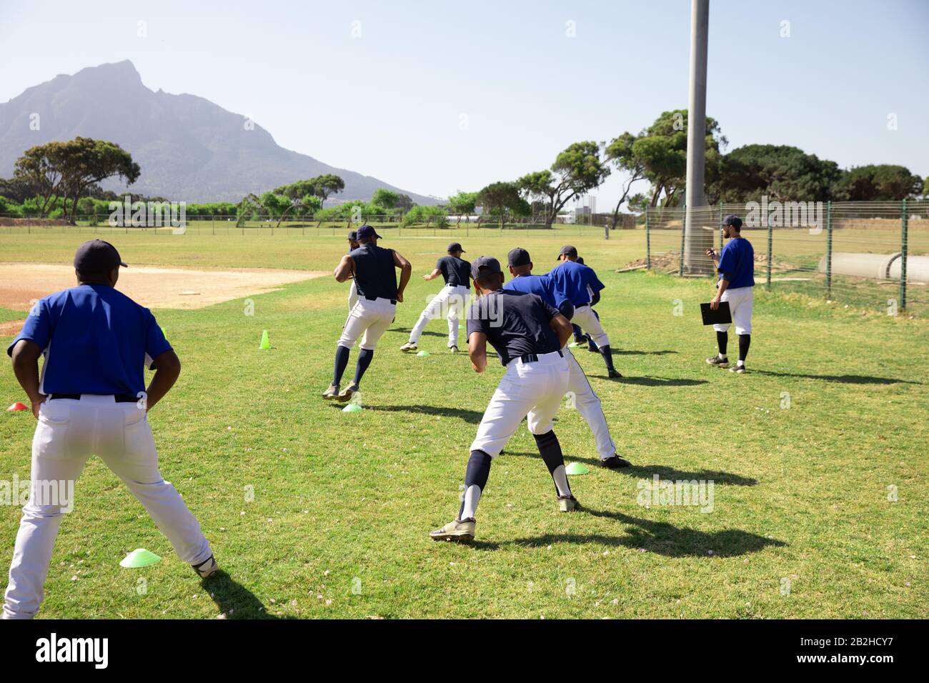 Baseball players training Stock Photo - Alamy