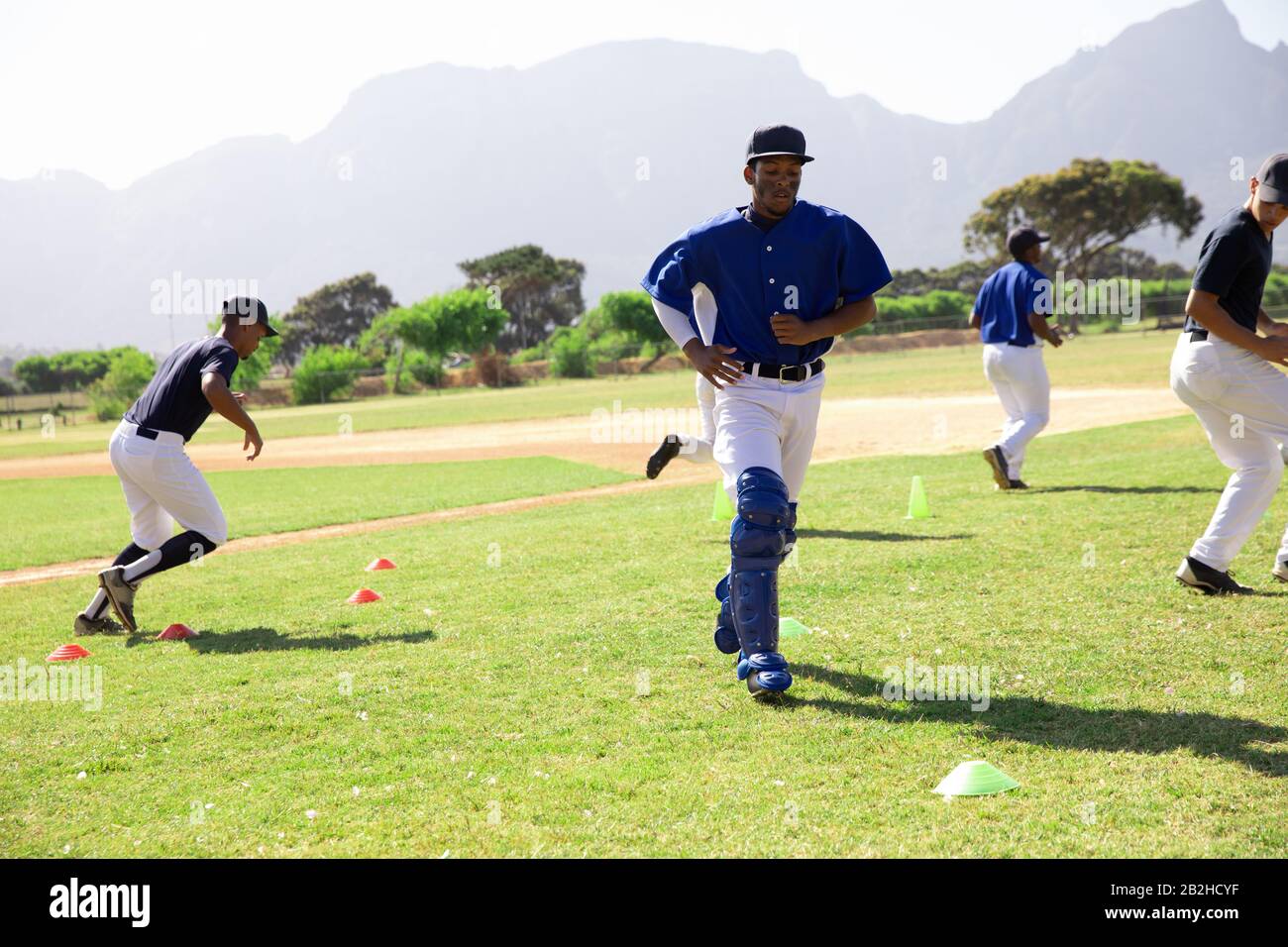 Trainer stretching player hi-res stock photography and images - Alamy