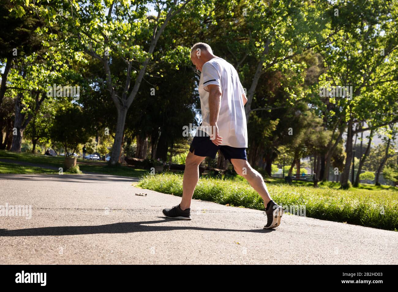 Male jogger in park hi-res stock photography and images - Alamy