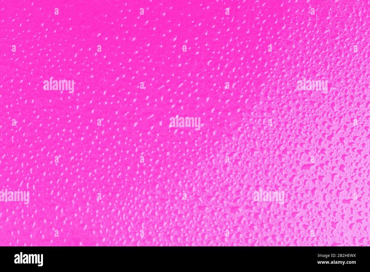 Deep saturated fuchsia color gradient color background with water drop ...