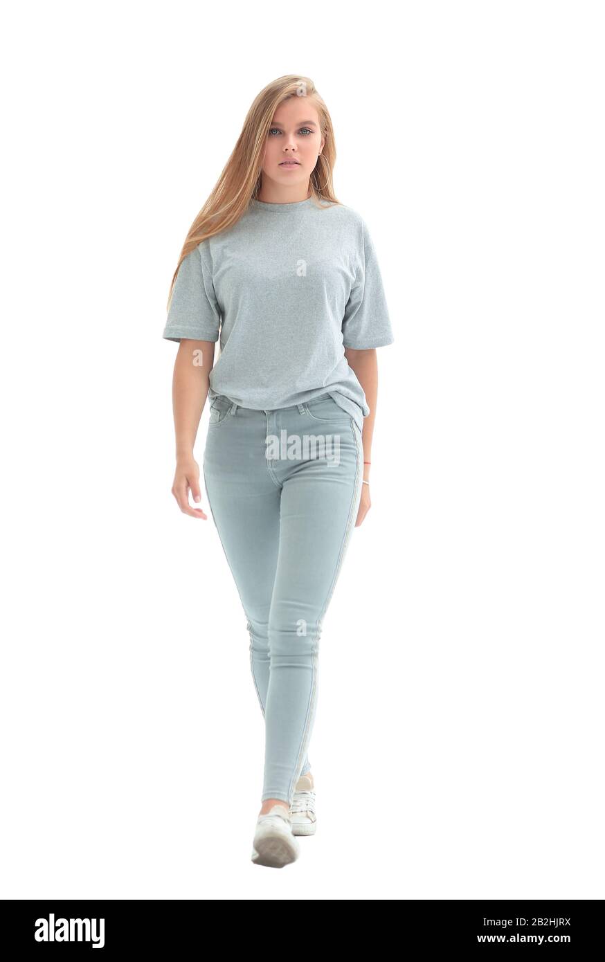 full length . modern young woman striding towards her goal Stock Photo ...