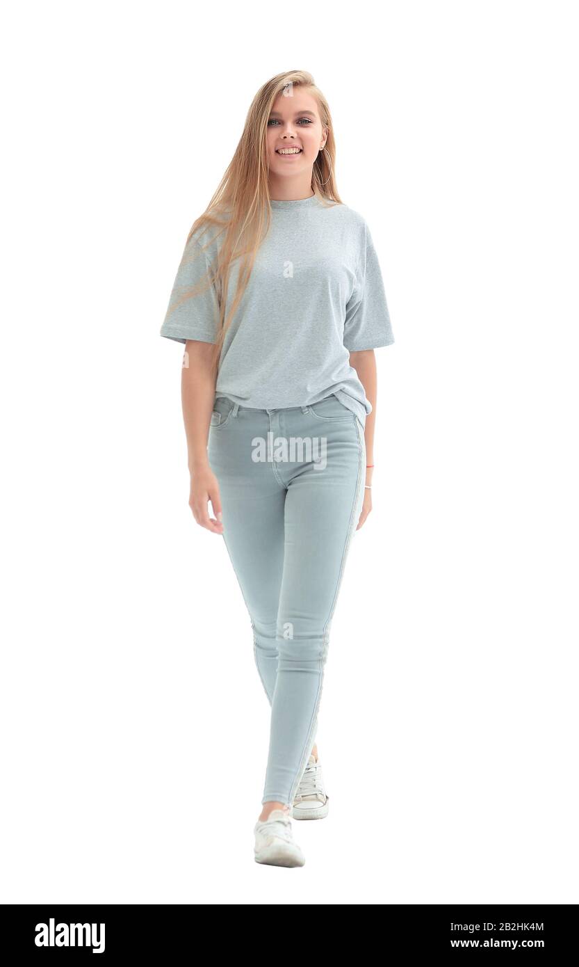 full length . modern young woman striding towards her goal Stock Photo ...