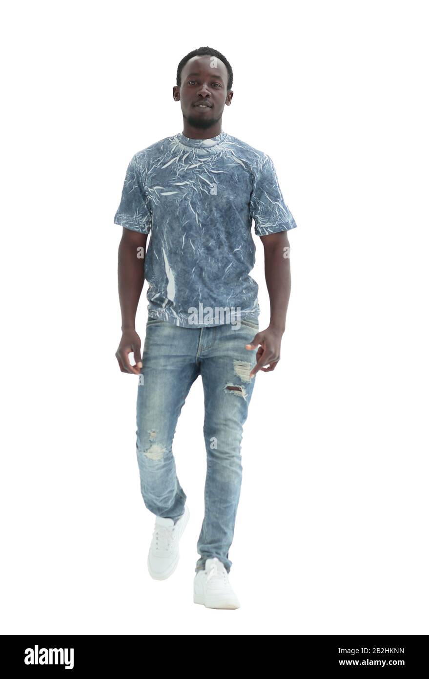 in full growth. casual young man confidently striding forward Stock ...