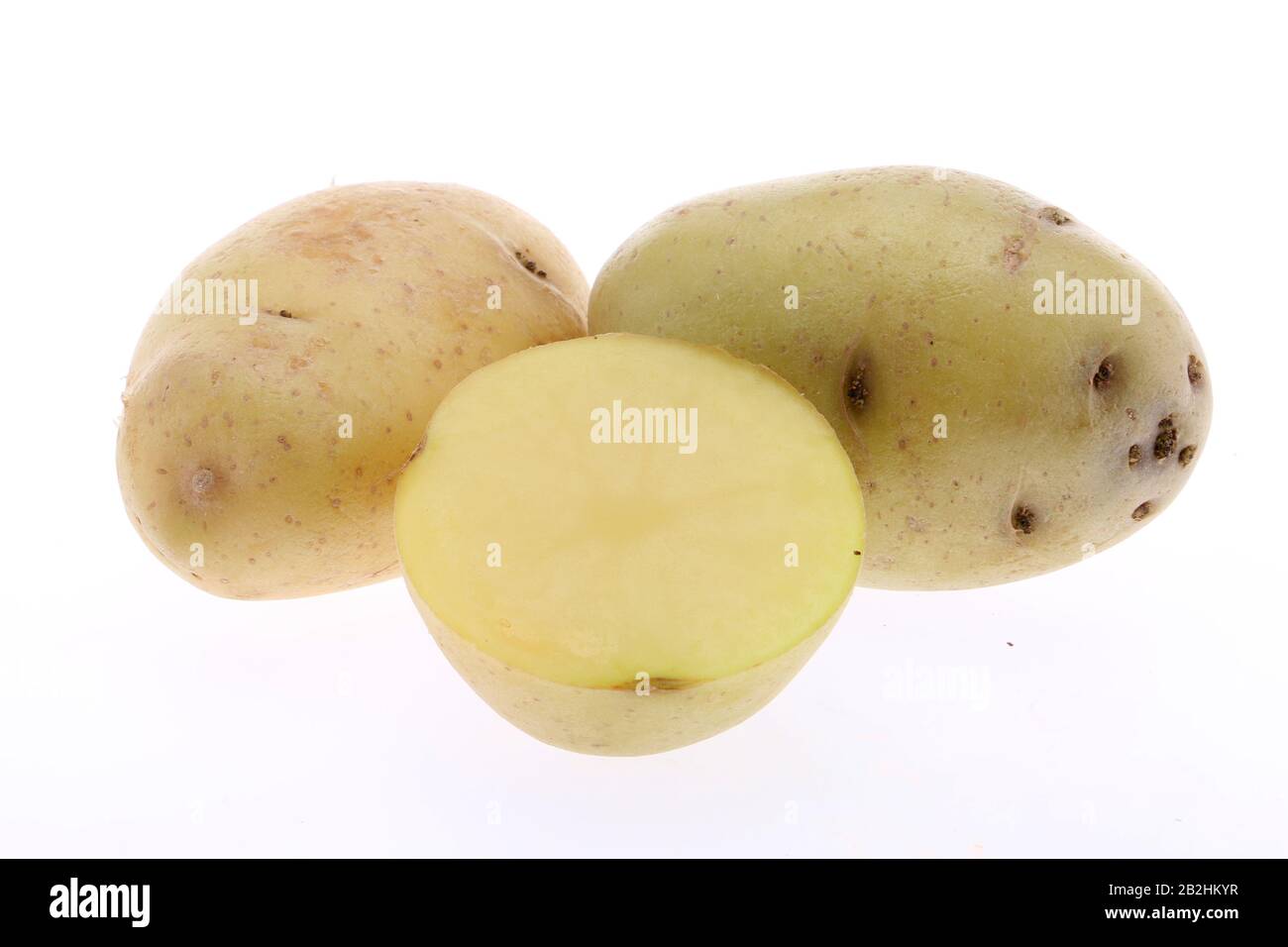 Isolated Australian potatoes. Cut raw potato vegetables isolated on ...