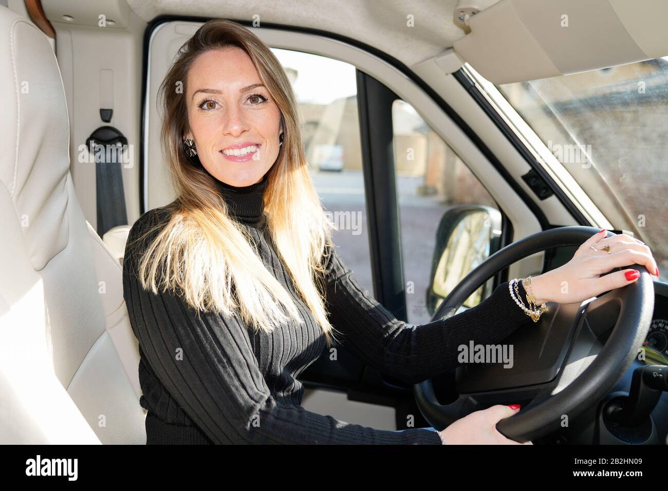 RV camper trailer travel woman driving motor home camping van tourist ...