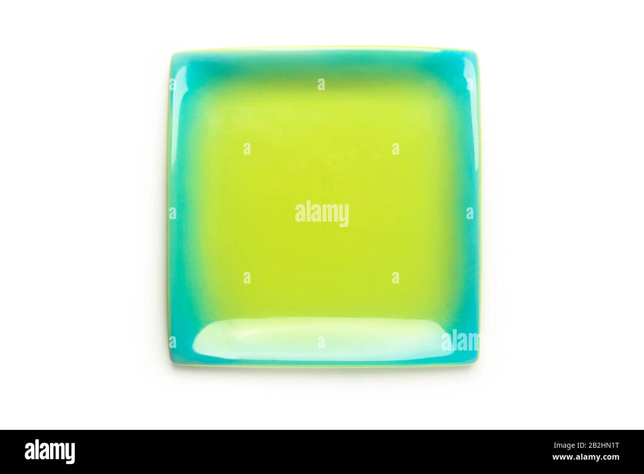 Ceramic dish of a square shape isolated on white Stock Photo - Alamy