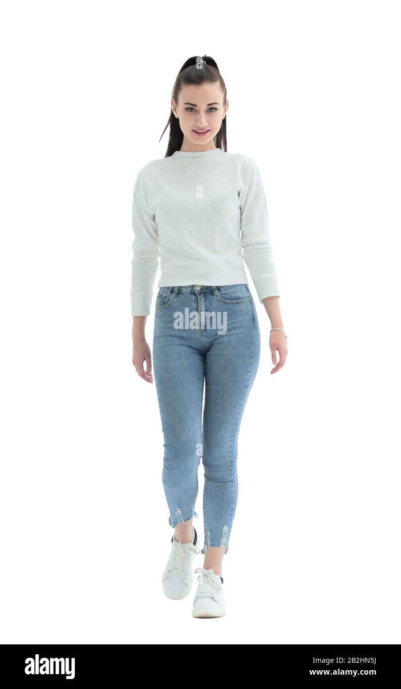 in full growth. a nice young woman, stepping forward Stock Photo - Alamy