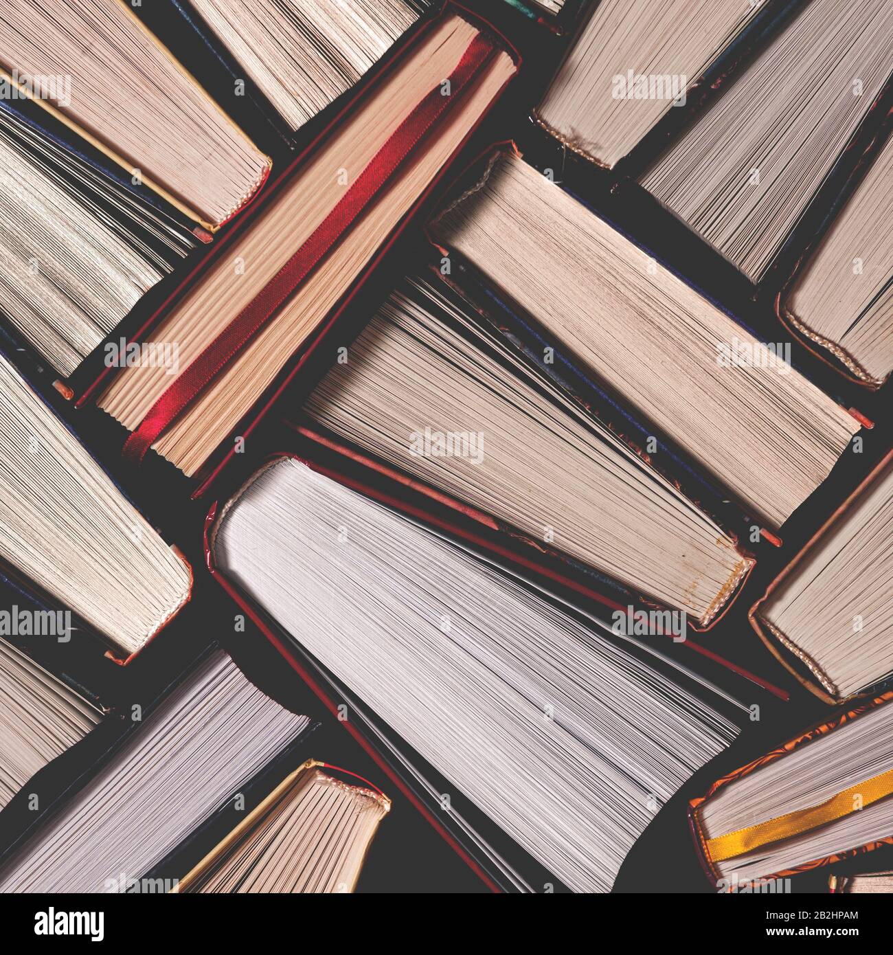Books. A lot of colorful books with multi-colored bookmarks prepare to ...