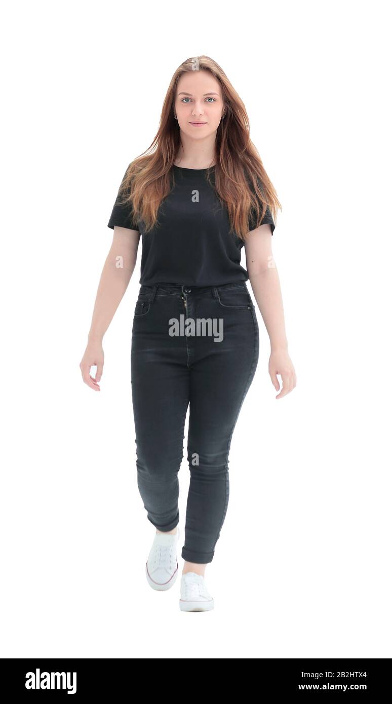 full length . confident young woman striding towards her goal Stock ...