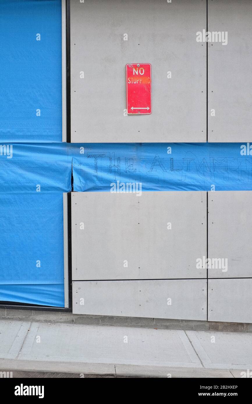 Construction work on an exterior wall clad in Fibre Cement sheet with ...