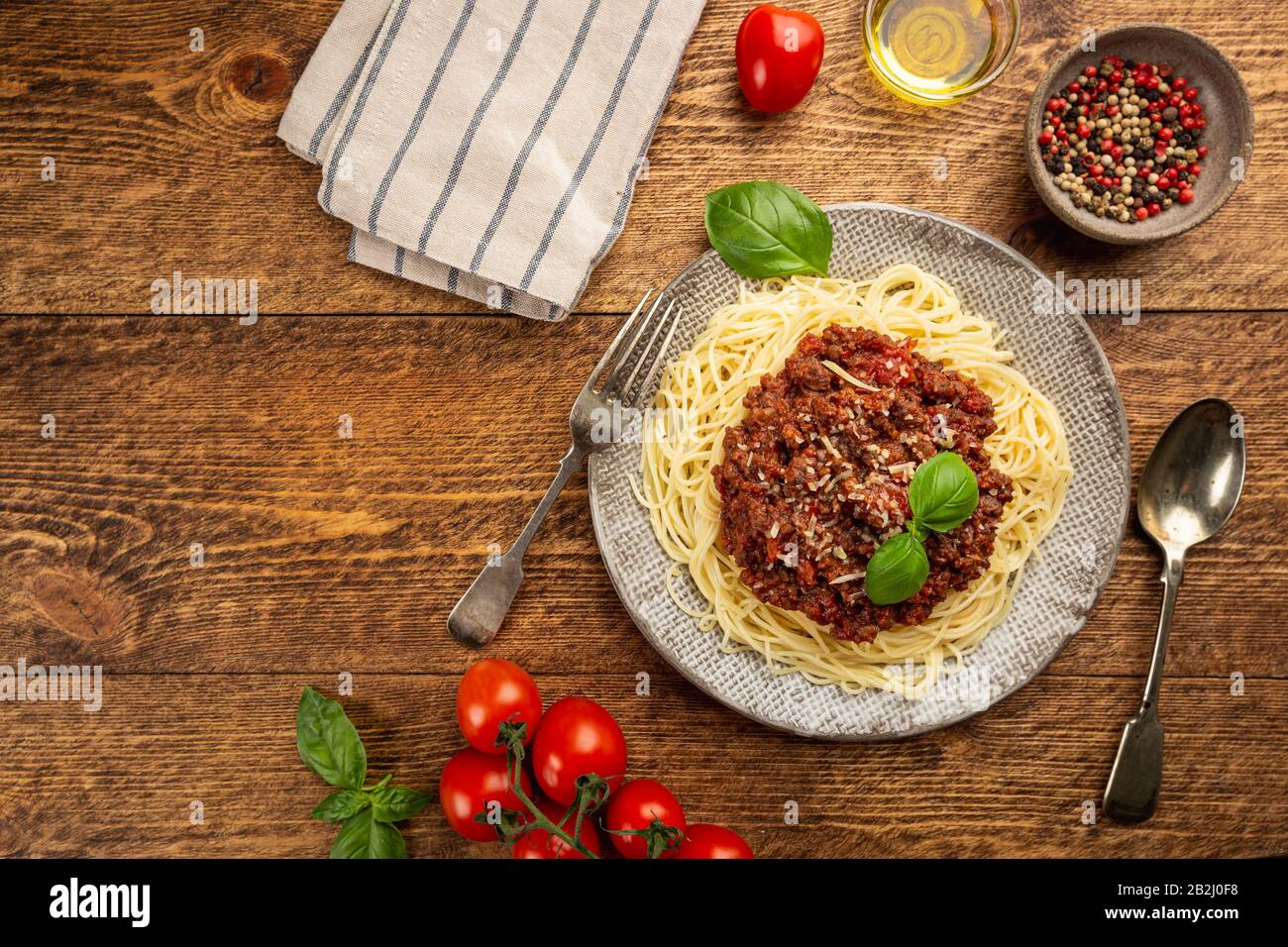 Spaghetti bolognese on the wooden table. Top view with copy space Stock ...