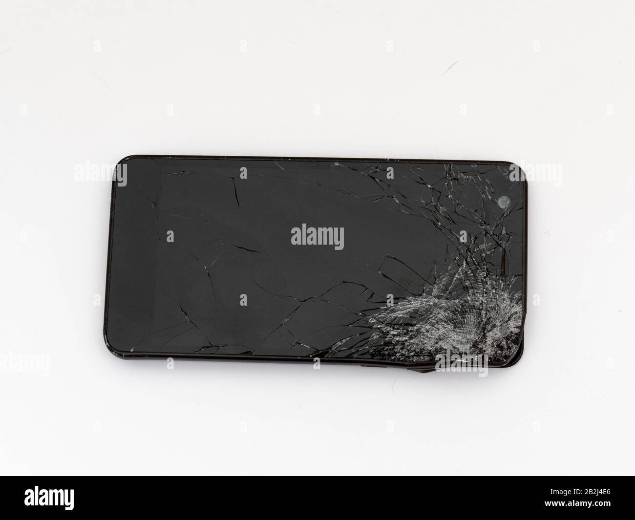 Modern smartphone with damaged screen isolated on white background ...