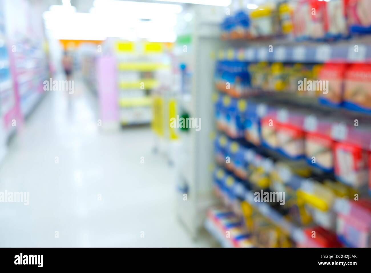 Abstract blurred shelf of modern supermarket store, Business background ...
