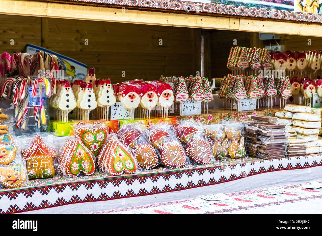 Gingerbread cookies and candies for sale at a food festival in ...