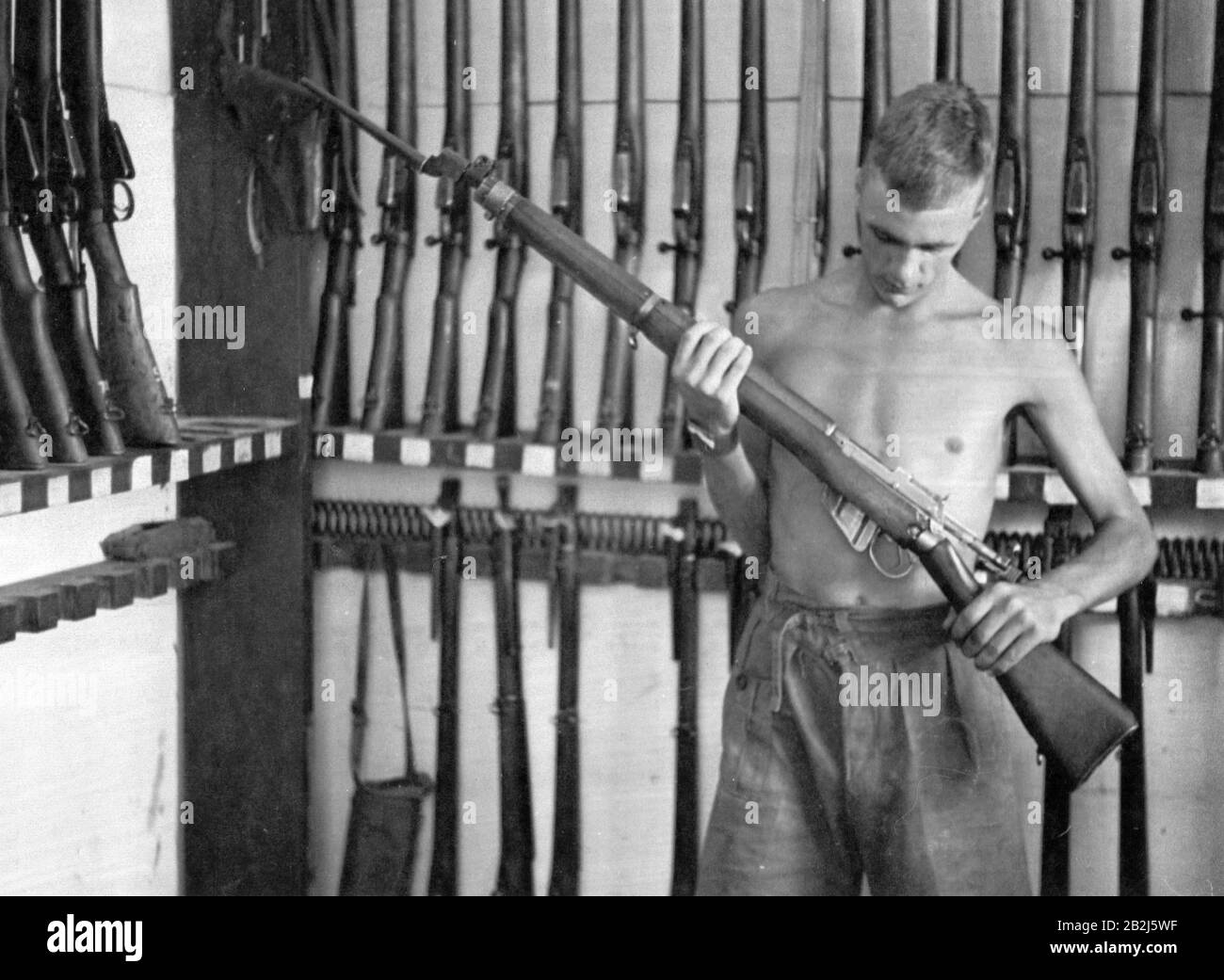 British soldier armoury rifles national service Stock Photo - Alamy