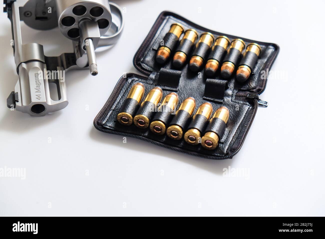 .44 magnum revolver gun with bullet on white background, Crime concept ...